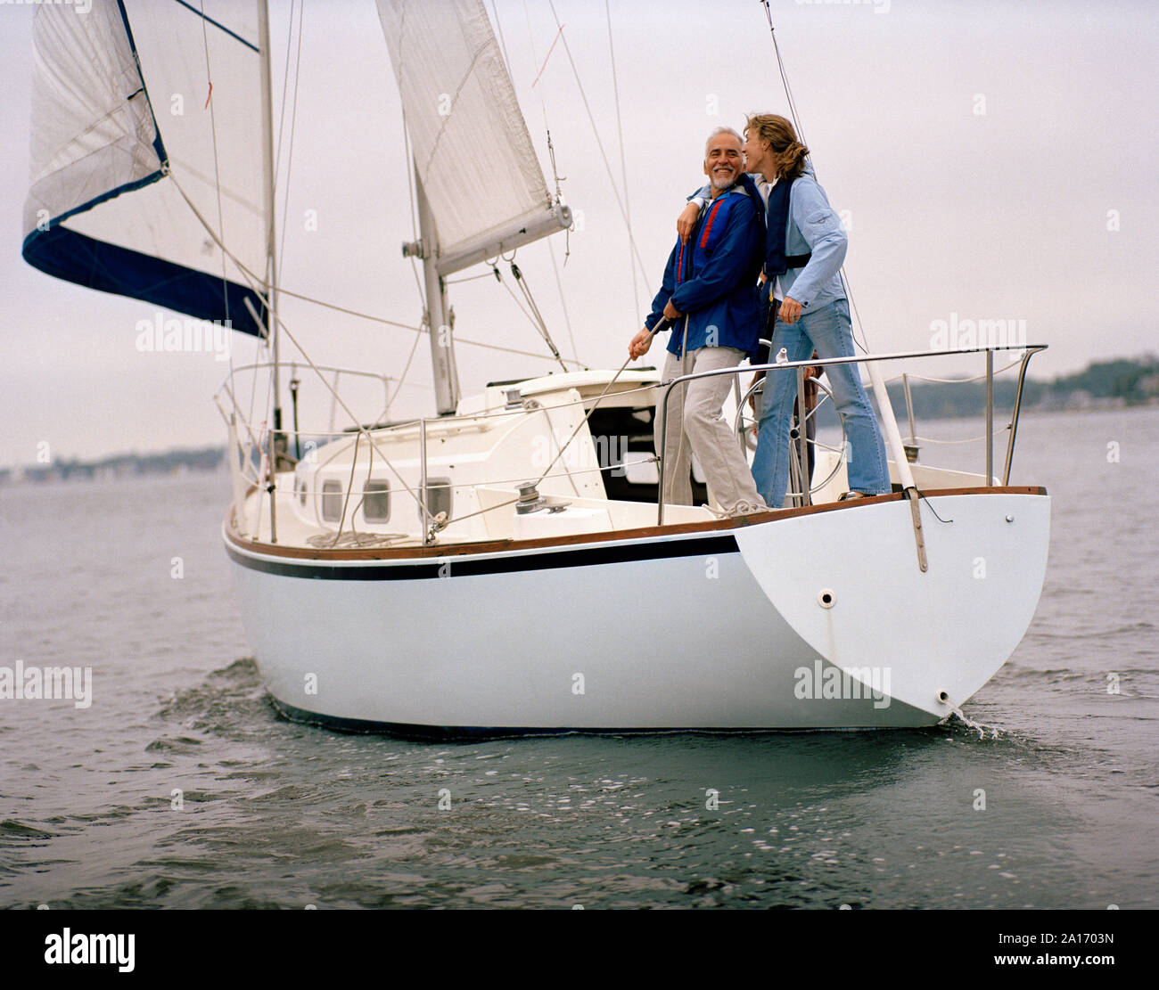 Two men together on sailboat hi-res stock photography and images - Alamy