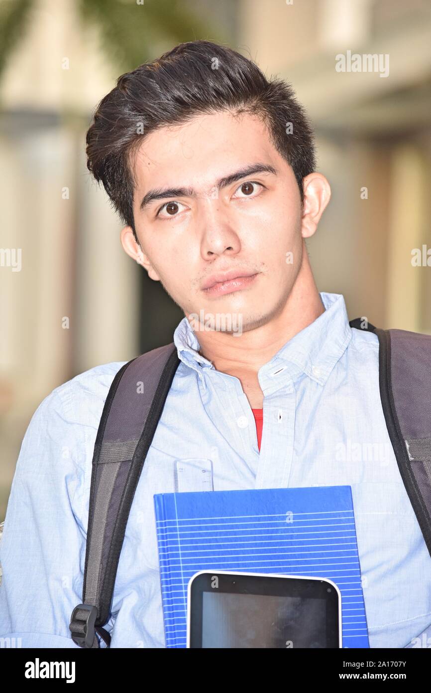 Sad male student hi-res stock photography and images - Alamy