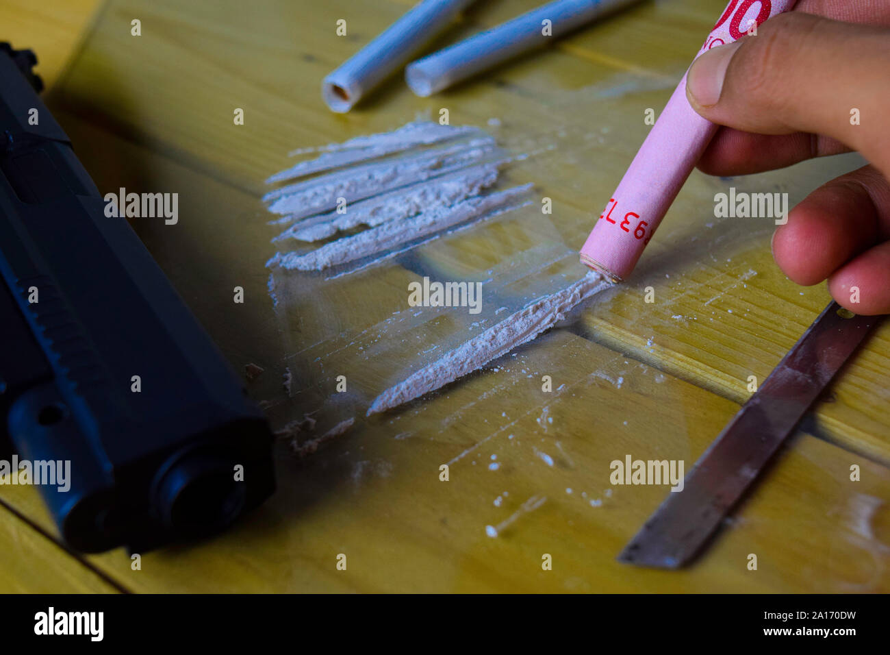 Cocaine ready for uses on wooden table. Cocaine Drug Addiction Concept ...