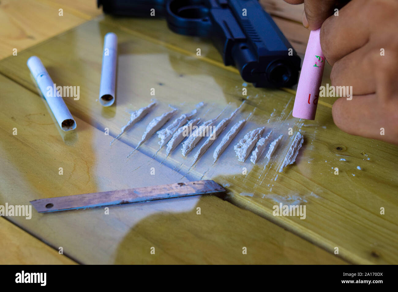 Cocaine ready for uses on wooden table. Cocaine Drug Addiction Concept ...