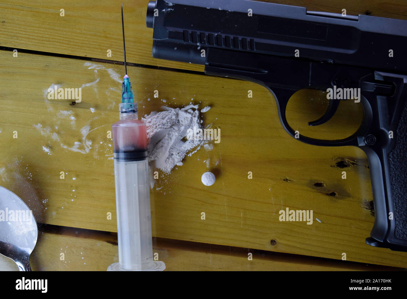 Cocaine ready for uses on wooden table. Cocaine Drug Addiction Concept ...