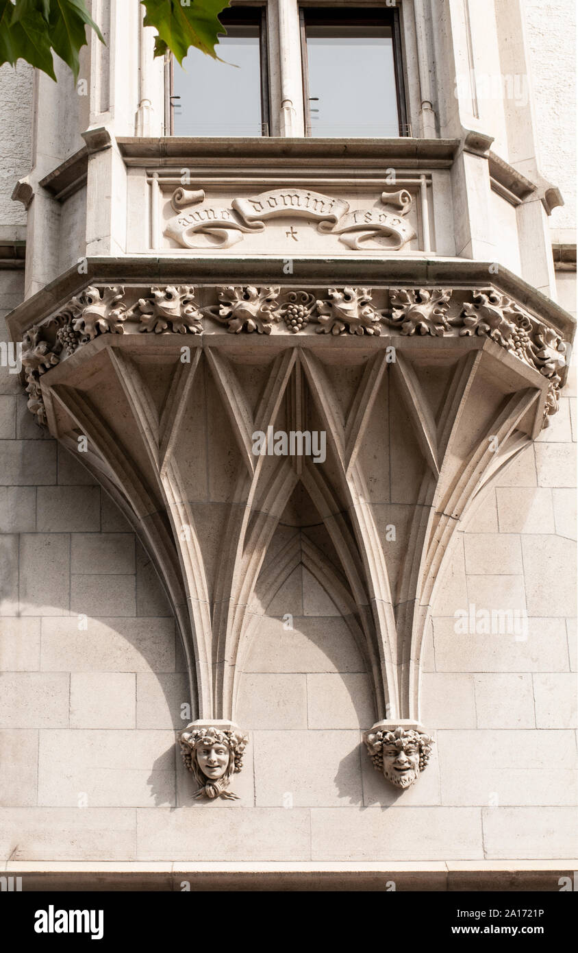 detail of a neogothic bay window at facade of historic building from ...