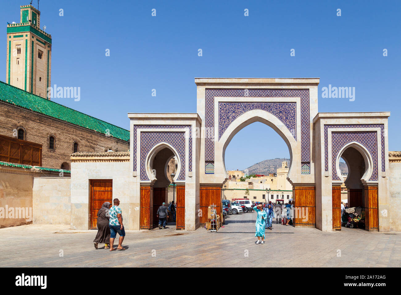 bab rcif mosque and blue arch in fes morocco Stock Photo - Alamy