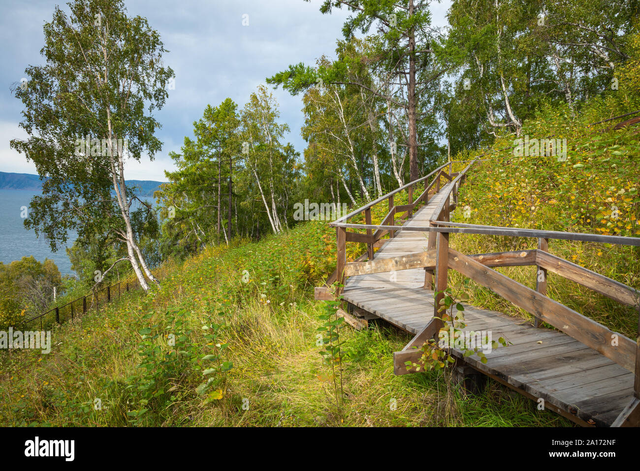 Angara river at lake Baikal in Listvyanka village. Summer landscape on ...