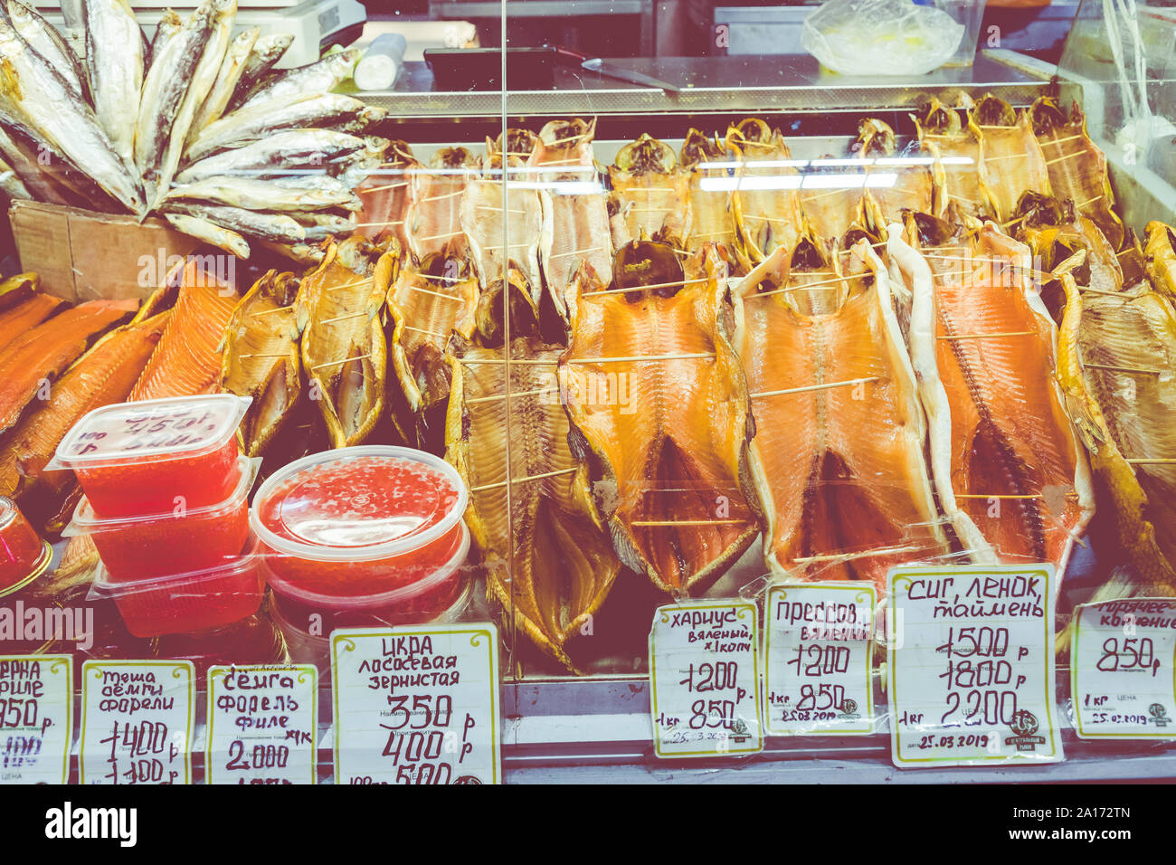 Dried fish Omul lying on the counter in Listvyanka, Lake Baikal ...