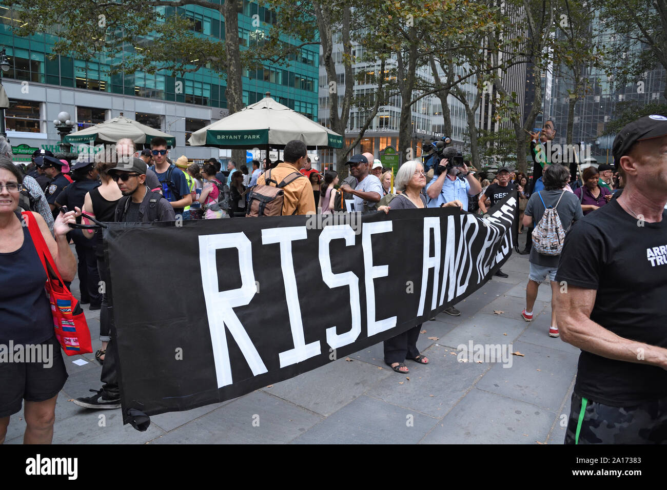 Anti Trump protesters with a huge banner during the Rise and Resist ...