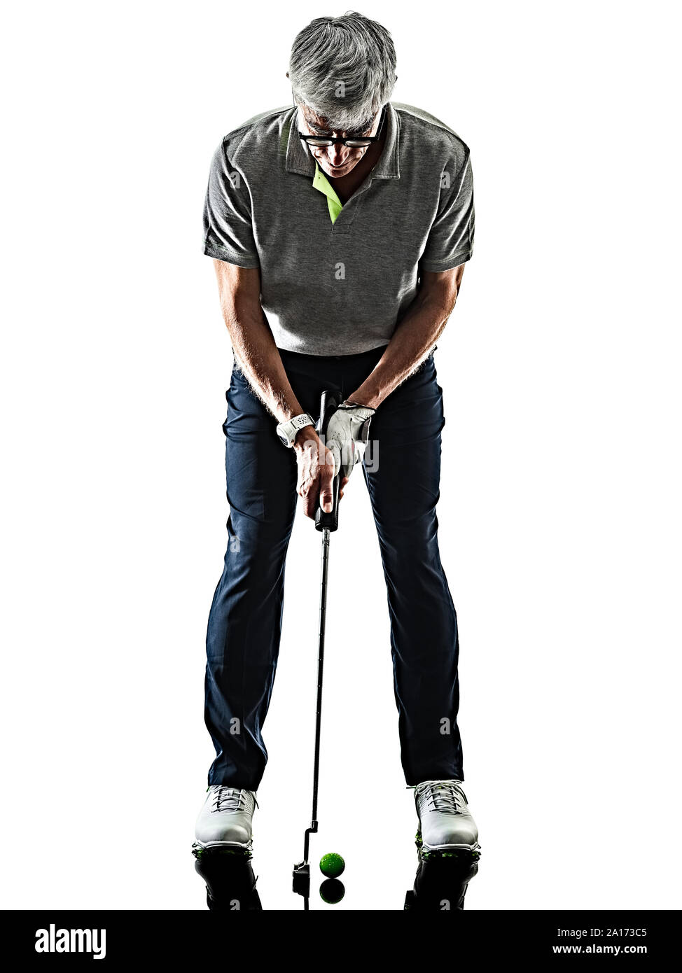 one caucasian senior man golfer golfing in studio shadow silhouette ...