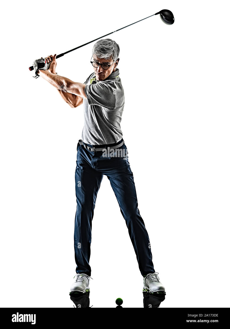 one caucasian senior man golfer golfing in studio shadow silhouette ...