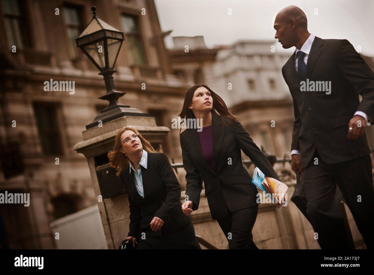 Three guys walking together hi-res stock photography and images - Alamy