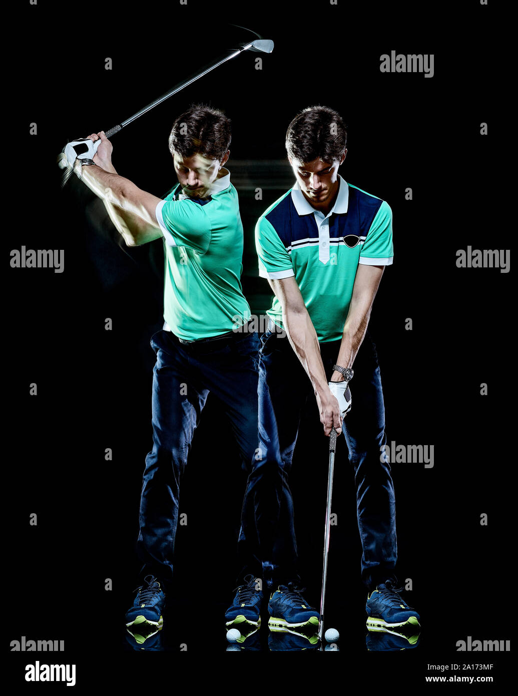one caucasian young golfer man golfing golf swing isolated on black ...