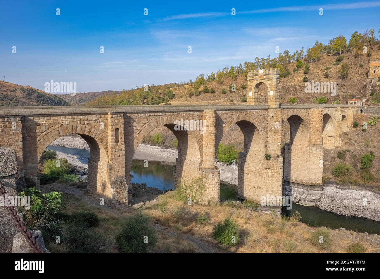 The Roman bridge of Alcantara is a two thousand year old stone bridge ...
