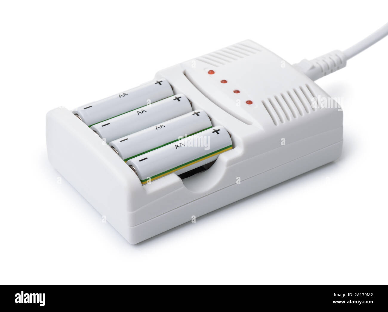 Rechargeable batteries in charger isolated on white Stock Photo - Alamy