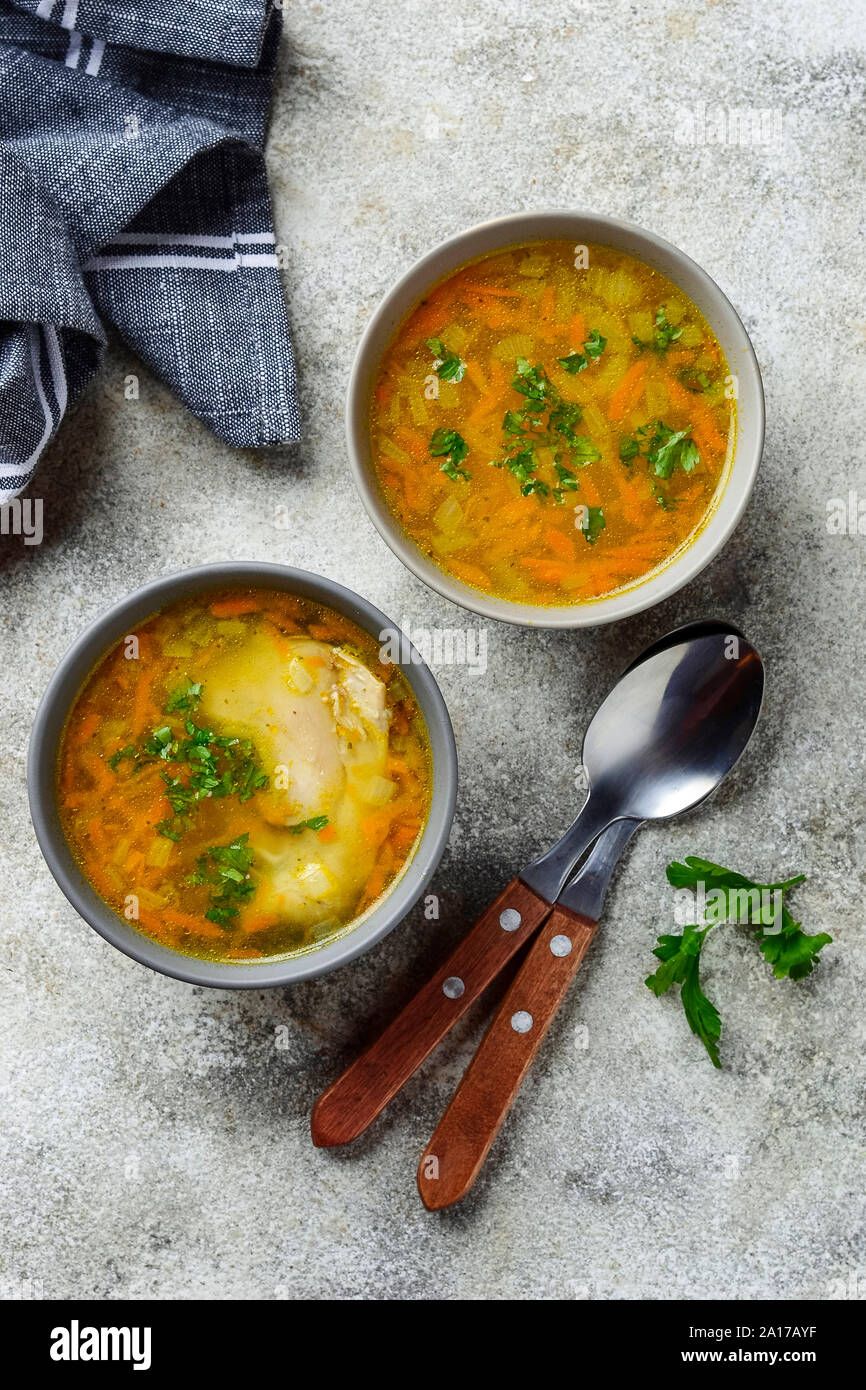 Chicken broth or soup with vegetable Stock Photo - Alamy