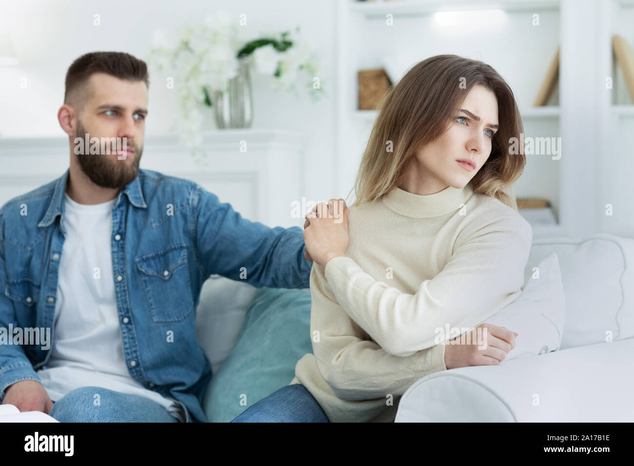 Relationship problems. Man consoling woman after argument Stock Photo ...