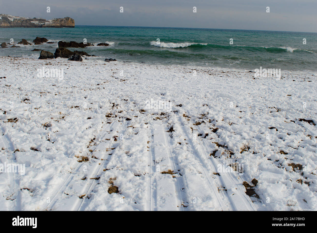 Snow on the beach Stock Photo - Alamy