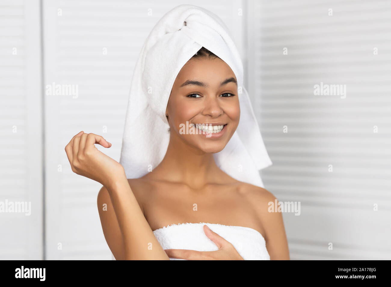 Young Lady Smiling At Camera Standing In Bathroom After Shower Stock ...