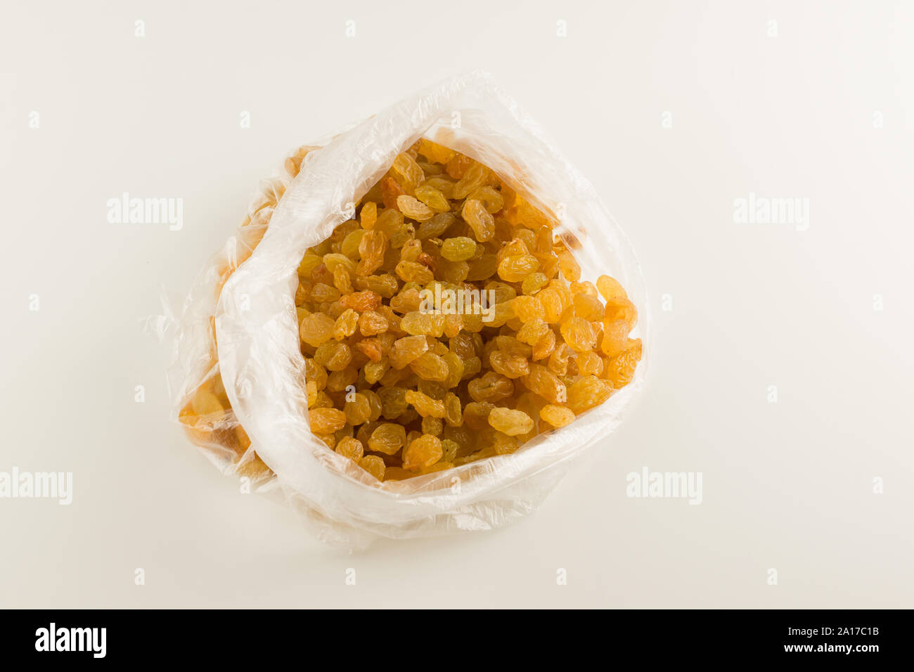 Fresh picked raisins isolated on white background and ready to eat ...