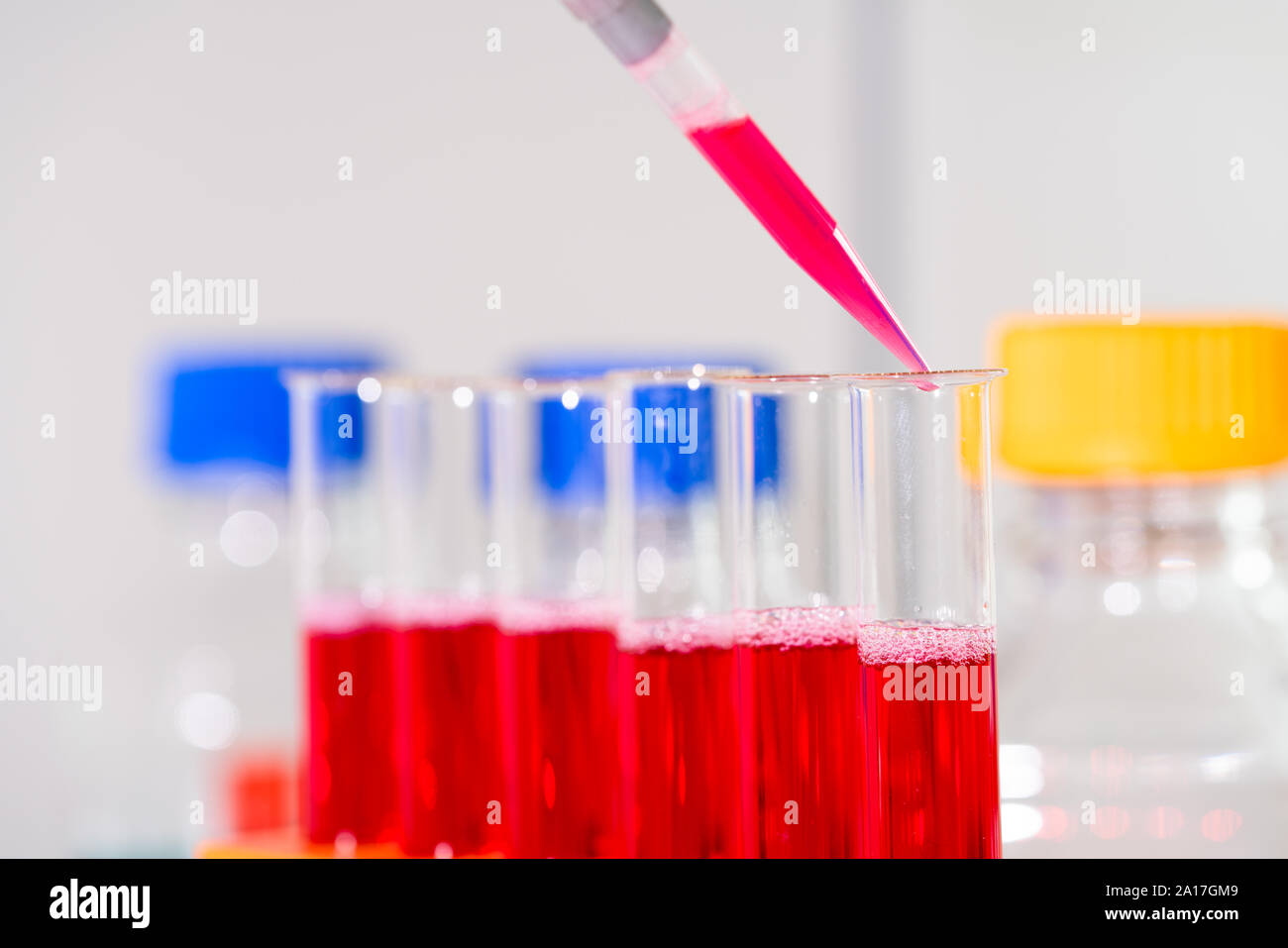 Test tube in rack and pipette media dispenser Stock Photo - Alamy