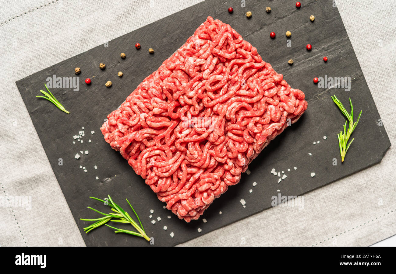 Colorful mince meat from angus wagyu beef against black background ...