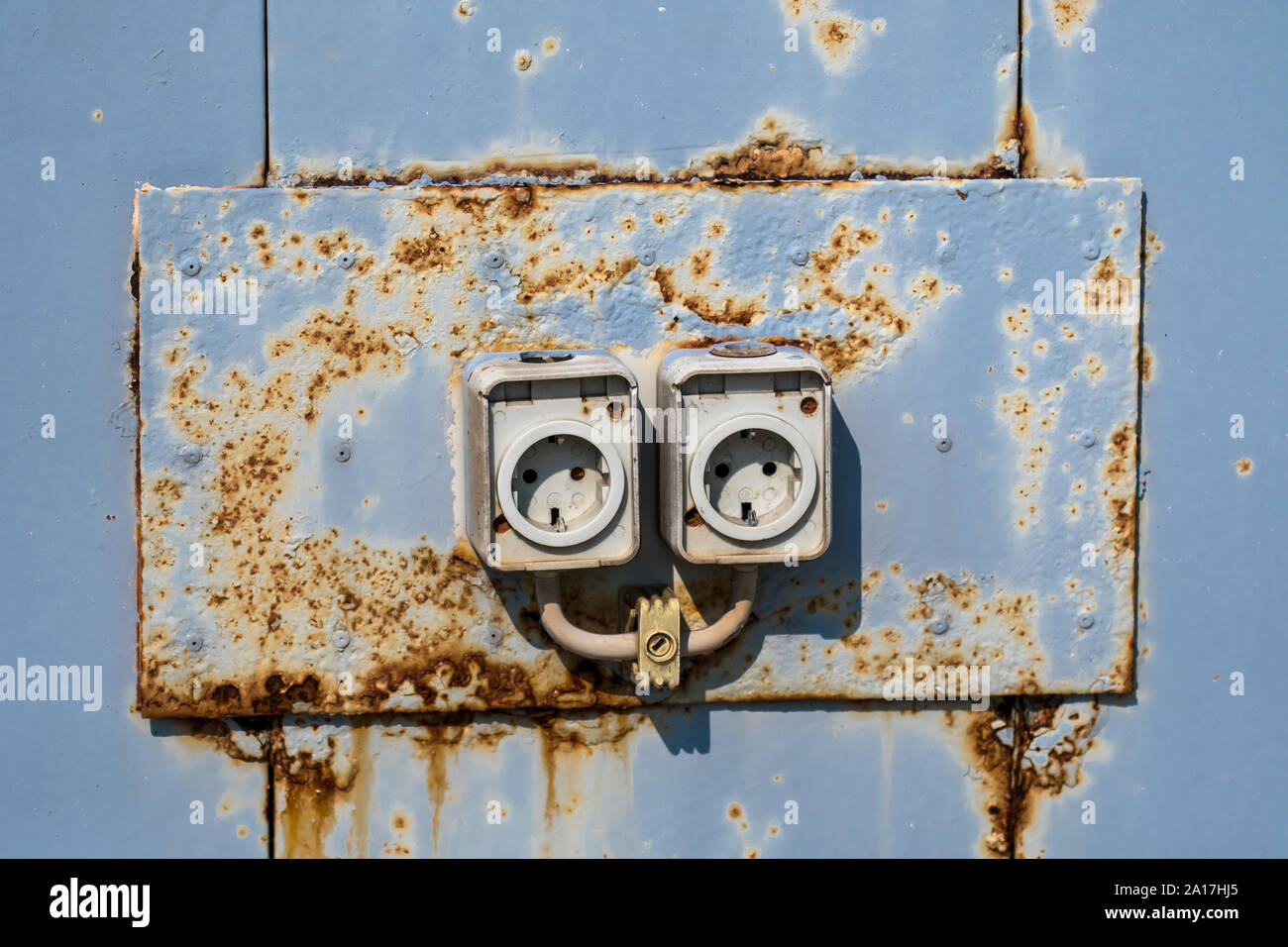 Two Old Rusty Electric Wall Sockets Stock Photo - Alamy