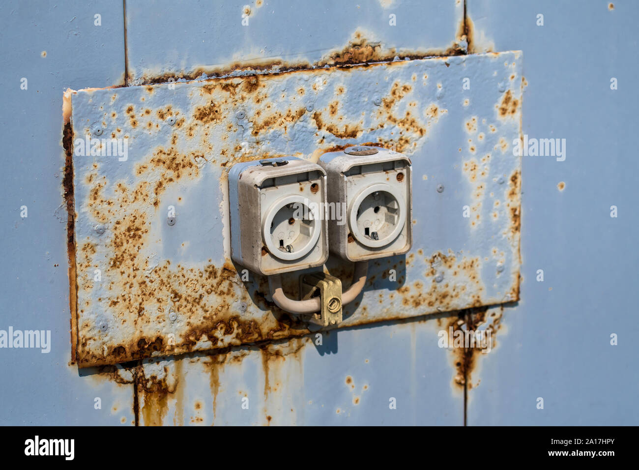 Two Old Rusty Electric Wall Sockets Stock Photo - Alamy
