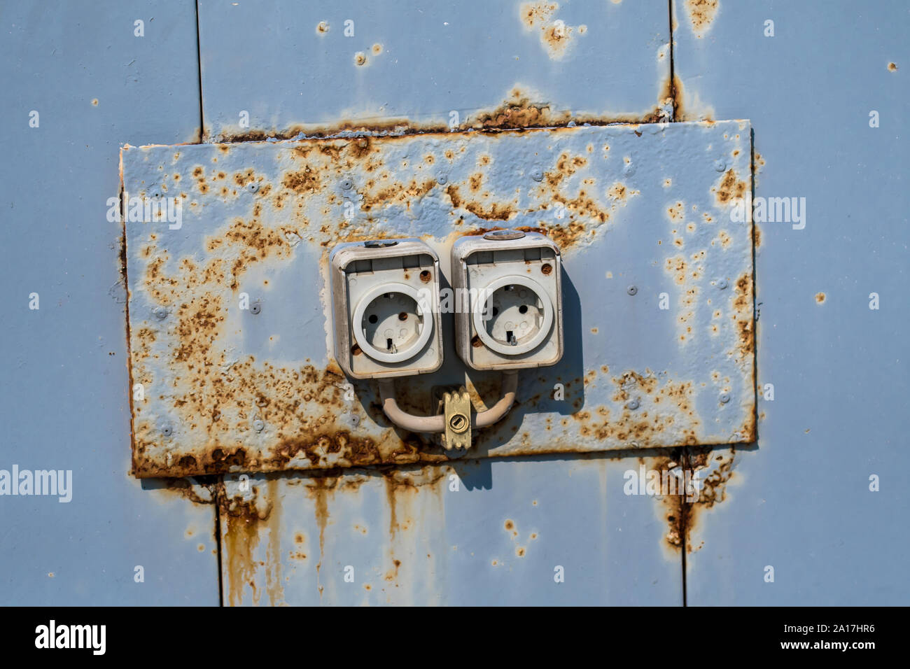 Two Old Rusty Electric Wall Sockets Stock Photo - Alamy