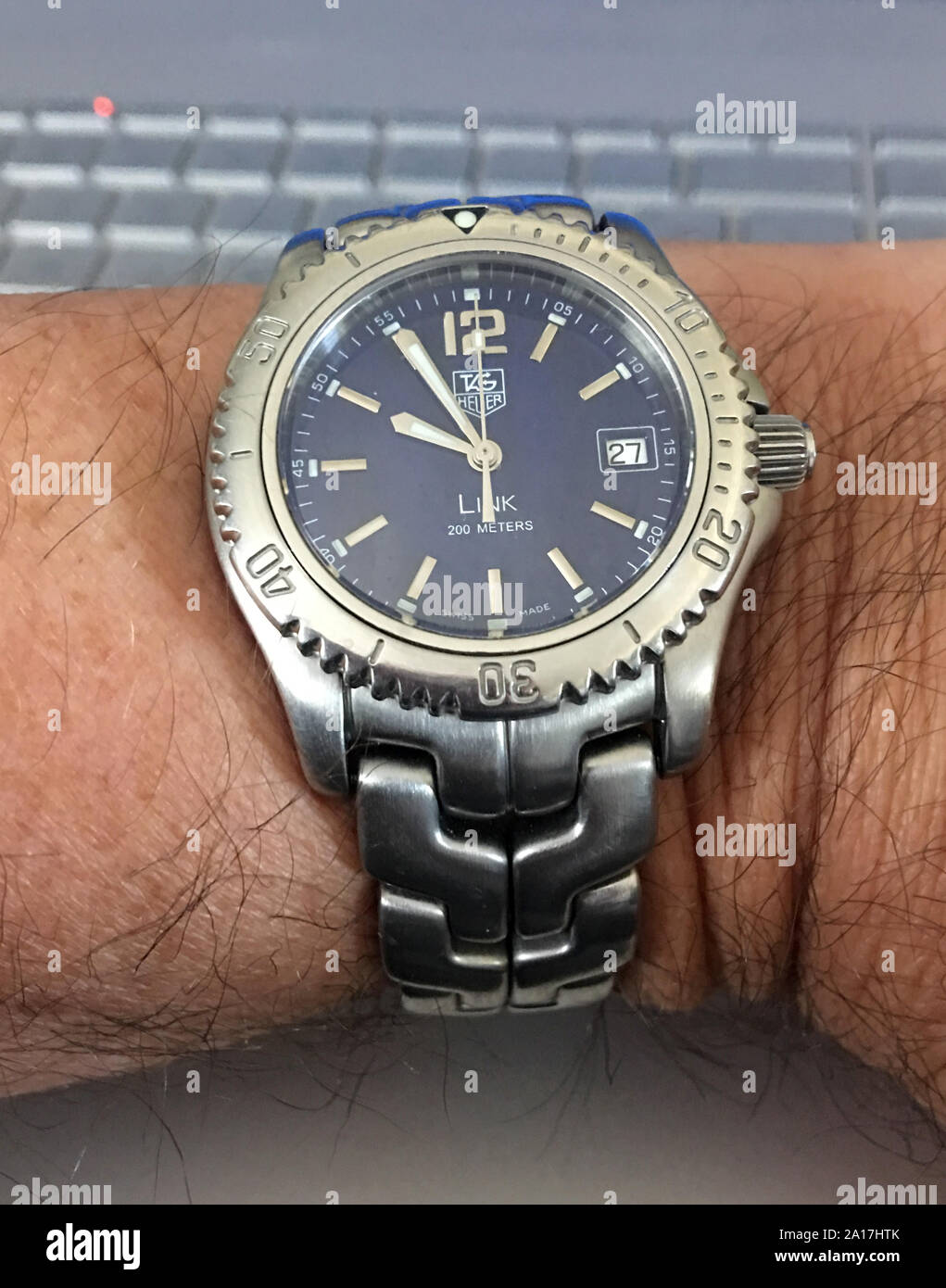 Mans brushed stainless steel with blue dial Tag Heuer watch Stock Photo ...