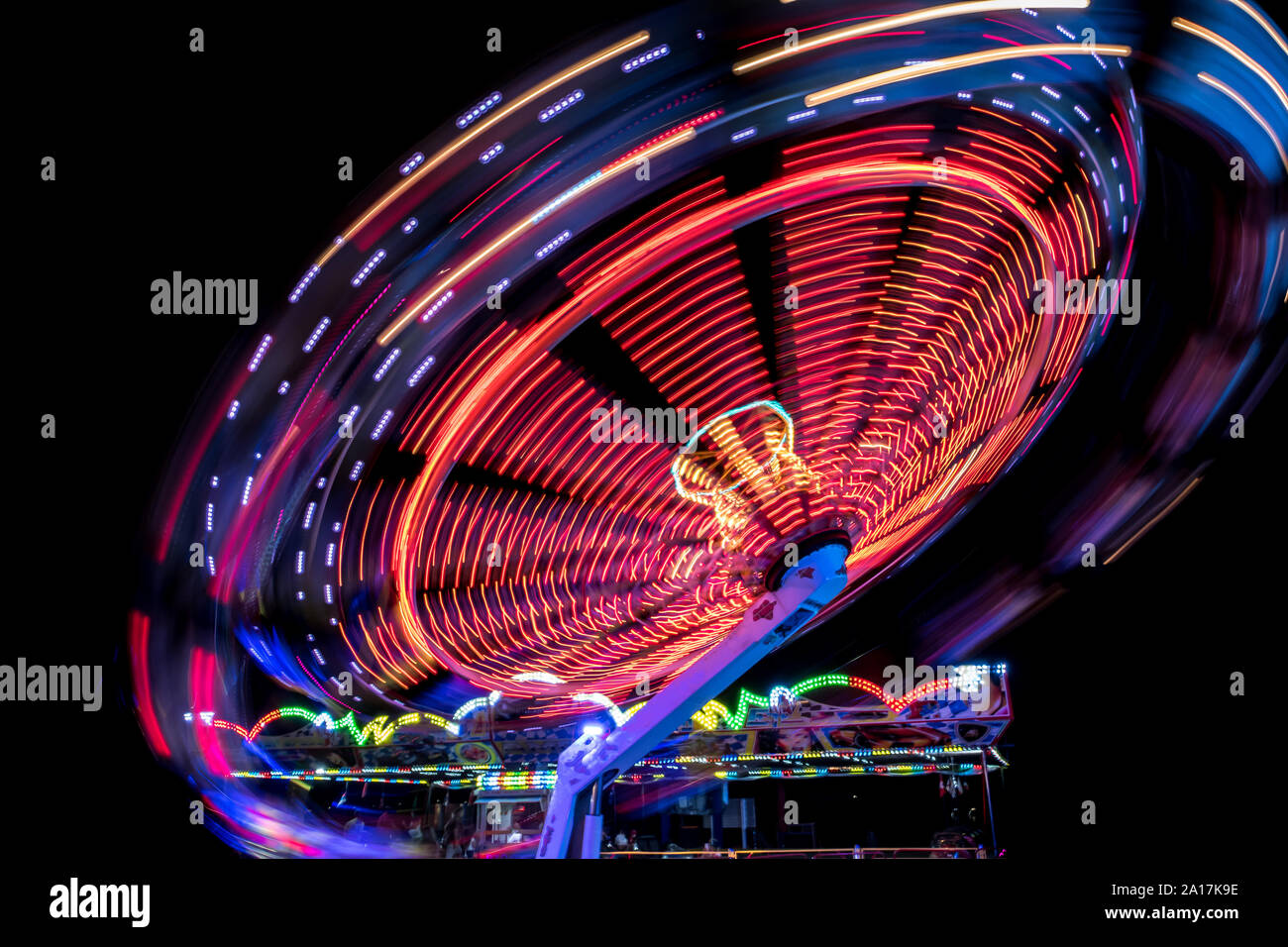 Rainbow roundabout hi-res stock photography and images - Alamy