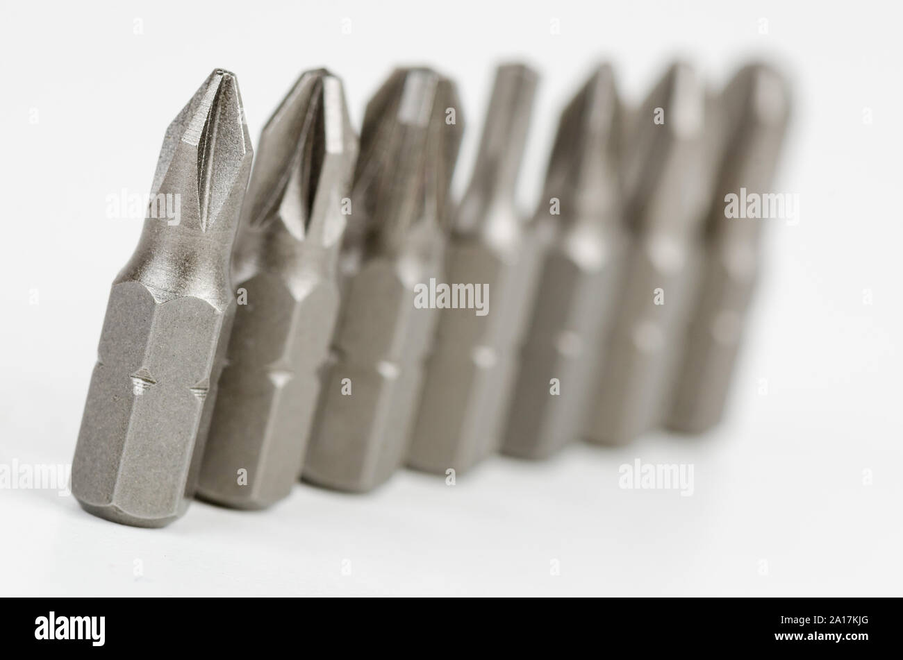 Sets of screwdriver bits isolated on white background Stock Photo - Alamy