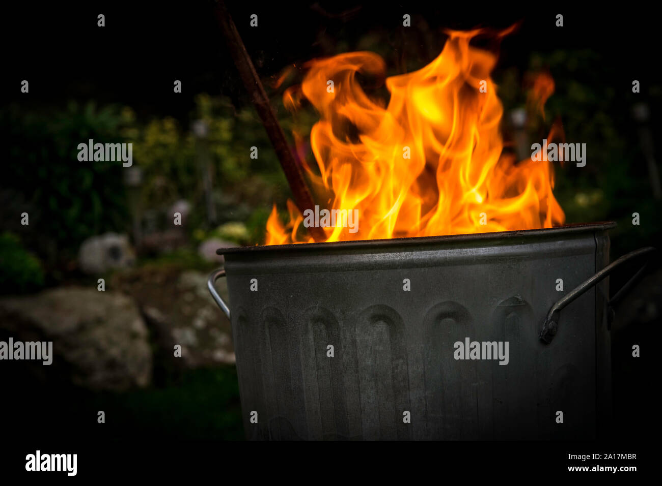 Close up of Small incinerator fire Stock Photo - Alamy
