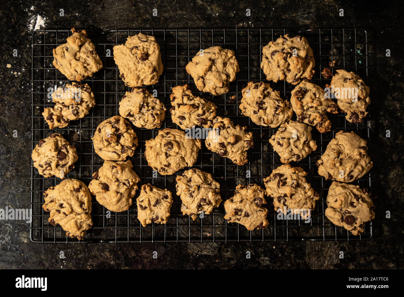 Chocolate Chip Cookies on Cooling Rake in Kitchen Stock Photo - Alamy