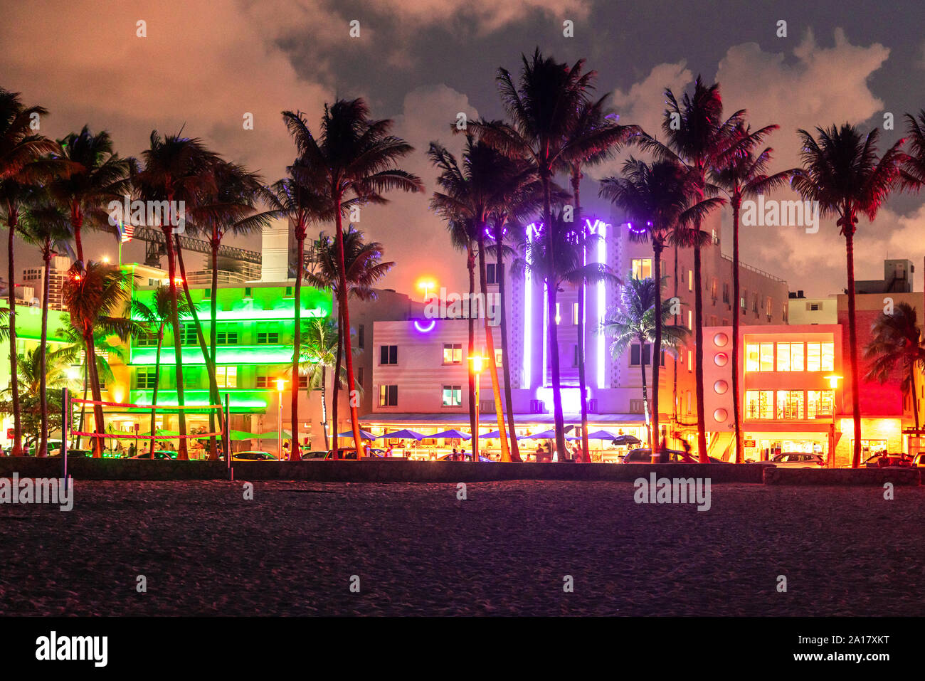 Miami Beach Ocean Drive hotels and restaurants at sunset. City skyline ...