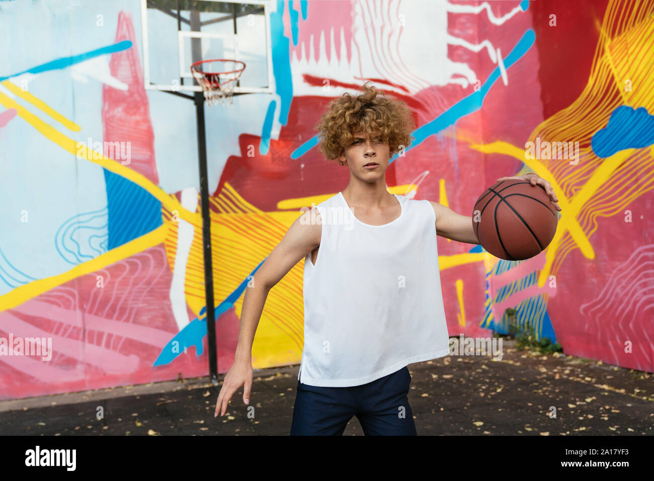 Handsome male playing basketball outdoor Stock Photo - Alamy