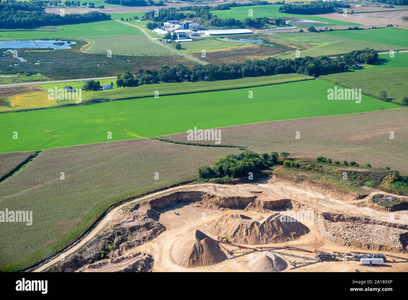 Aerial photograph of farmland and a limestone quarry. Dane County ...
