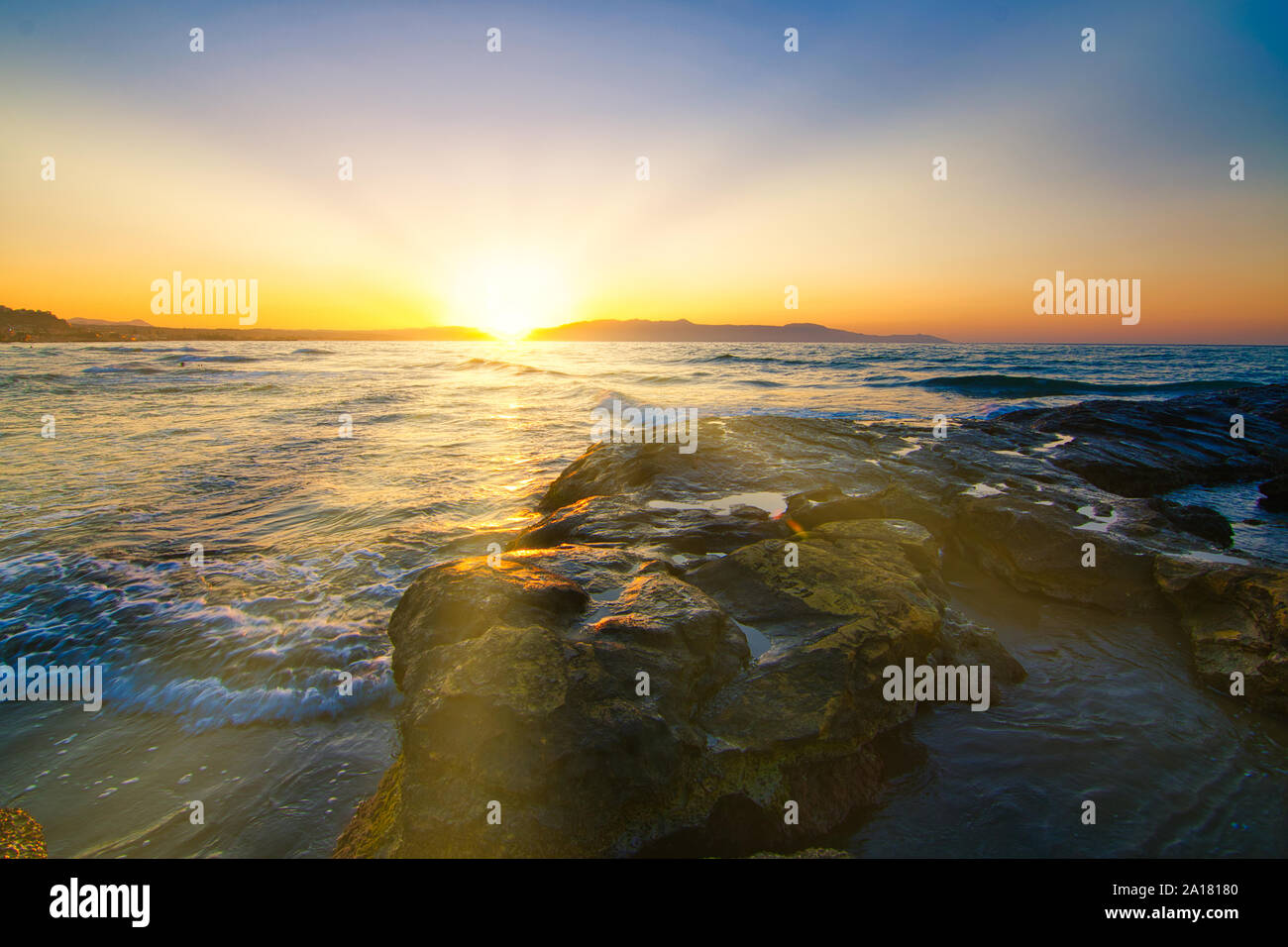 A fresh start and new hope with the rays of the Sun rising from the sea ...