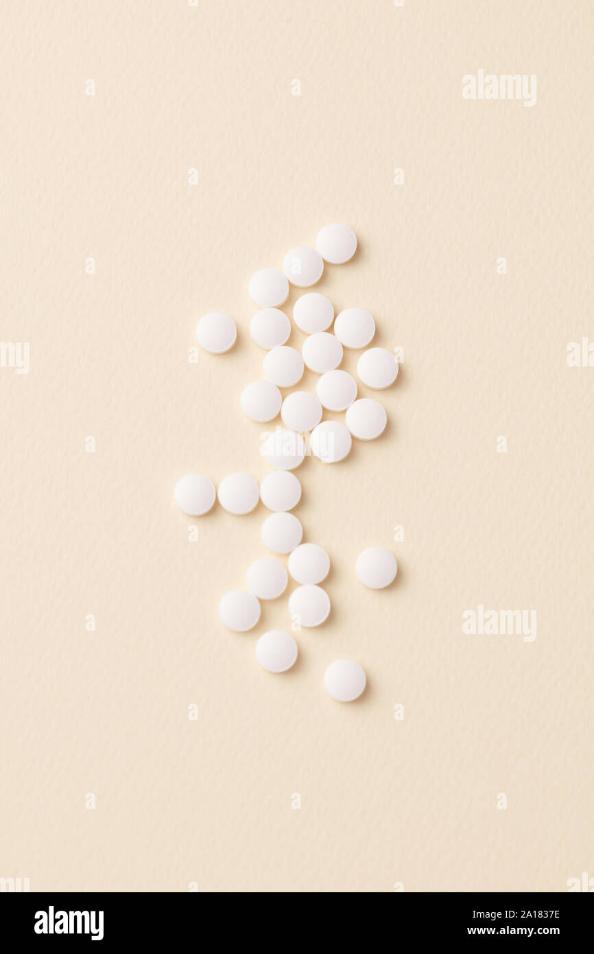 Biotin Tablets. Bright paper background. Top view. Copy space Stock ...