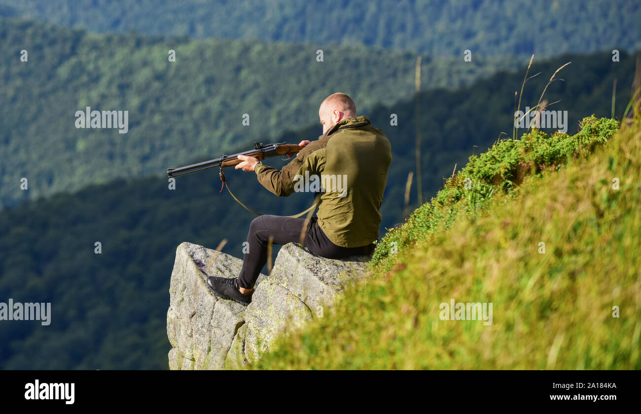 military style. male in camouflage. muscular man hold weapon. purpose ...
