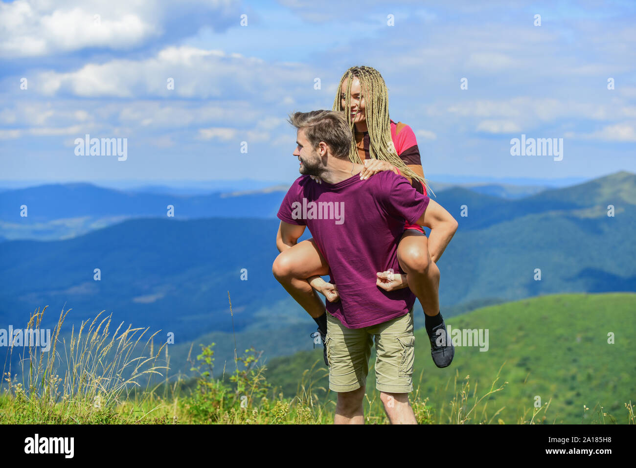 Beautiful couple embracing landscape background. Couple in love summer ...