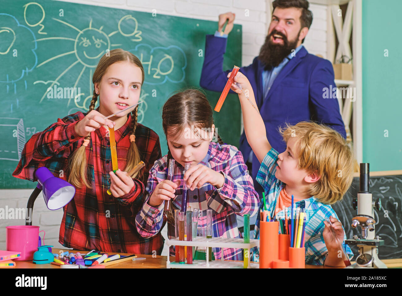 children making science experiments. Education. chemistry lab. happy ...