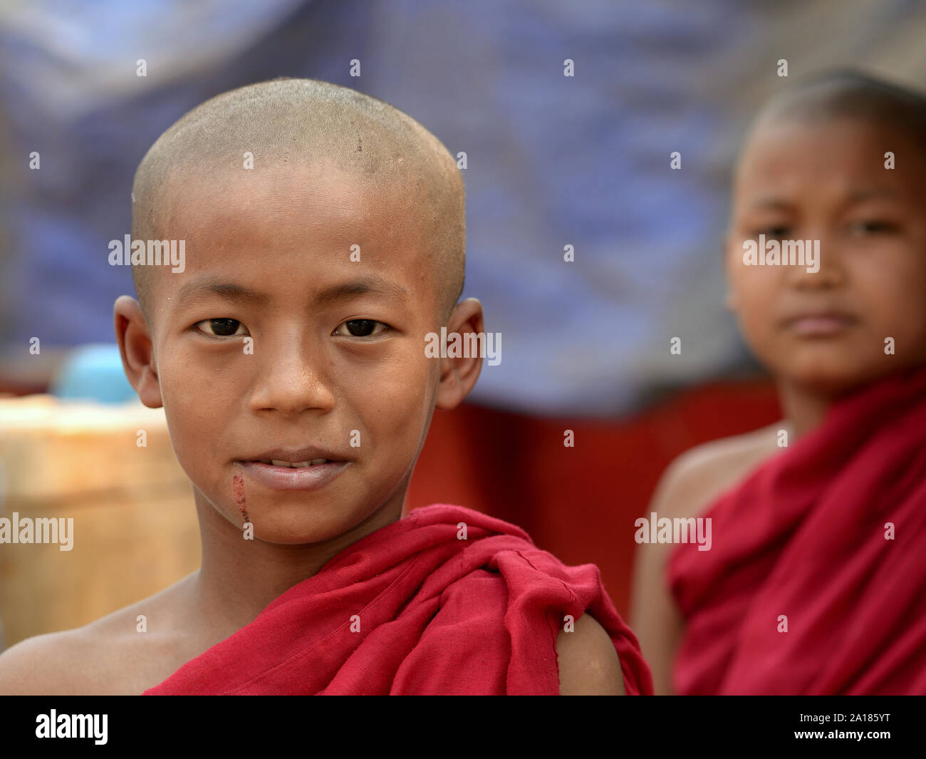 Two little Burmese Buddhist boy monks pose for the camera Stock Photo ...