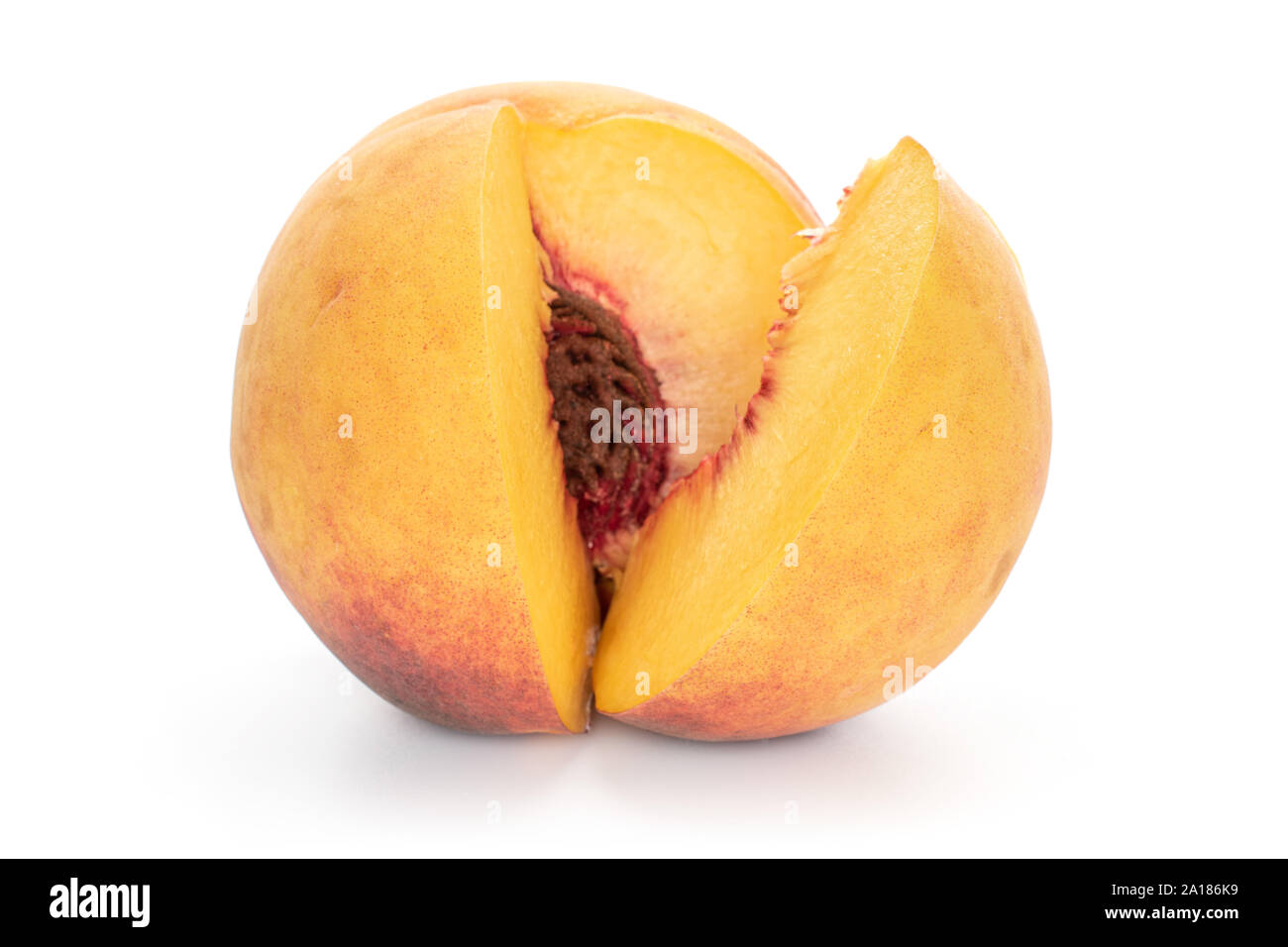 One sliced fresh fuzzy peach isolated on white background Stock Photo ...