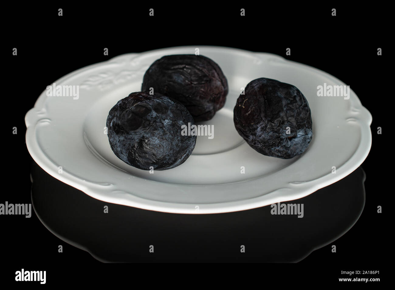 Wrinkled prune hi-res stock photography and images - Alamy