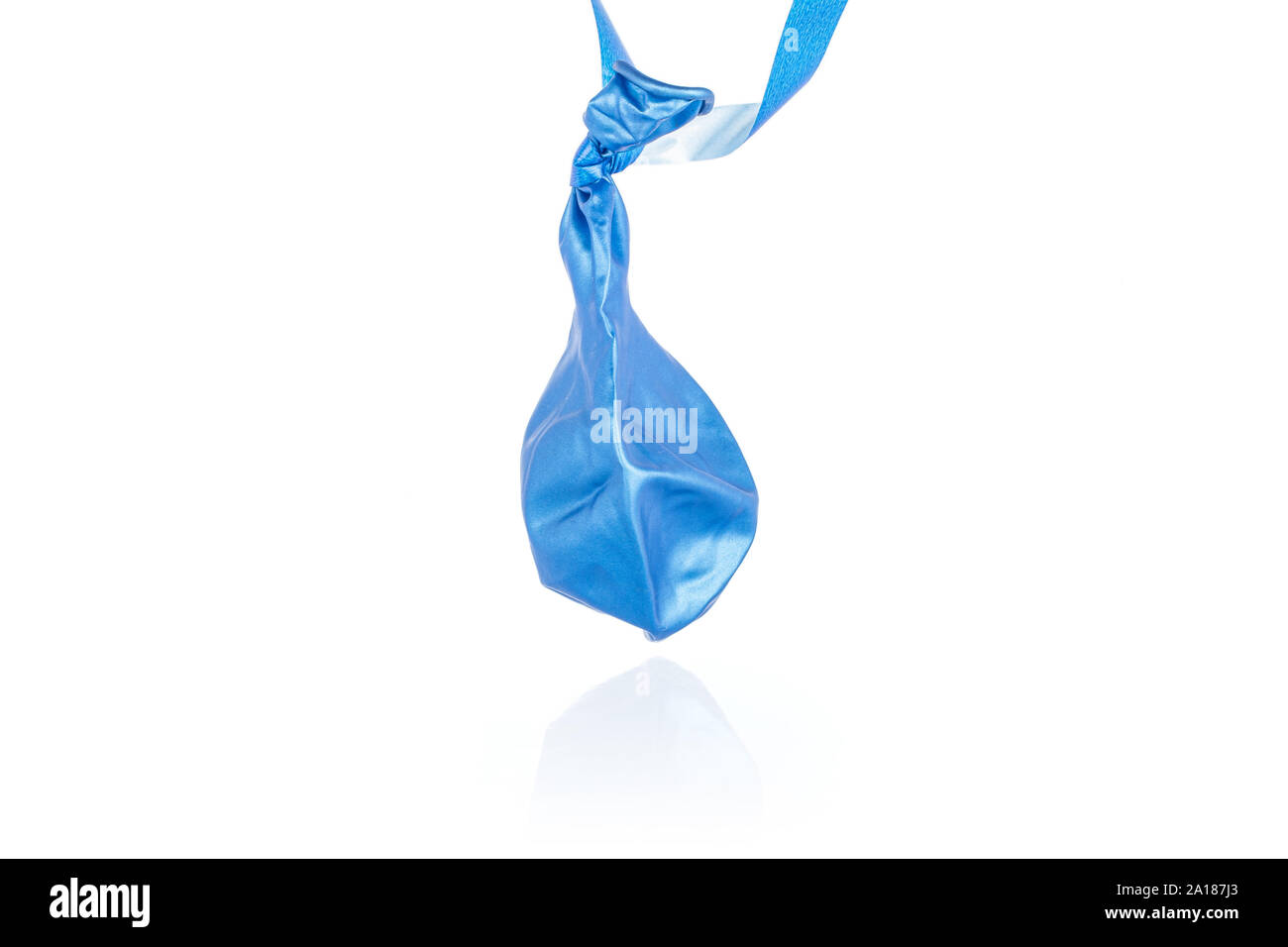One whole blue latex pastel ballon deflated with blue ribbon isolated ...