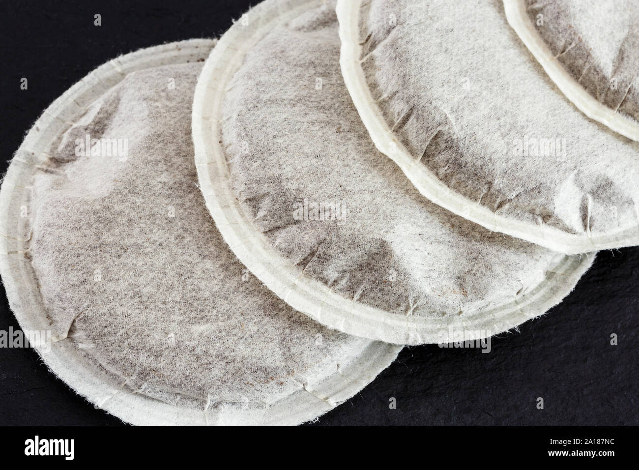 coffee bags for coffee machines on a black slate background Stock Photo ...