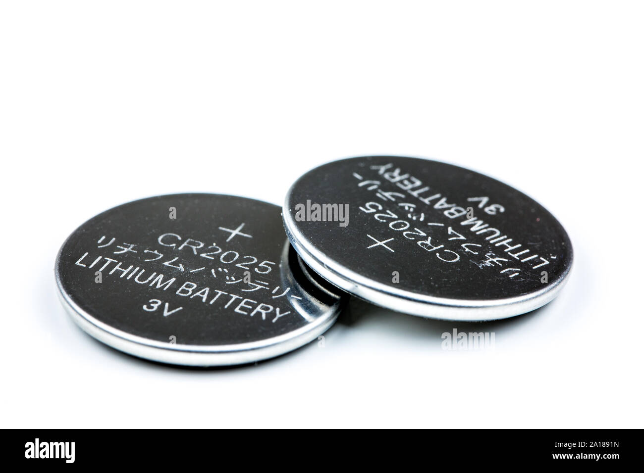 Closeup of Lithium button cell battery isolated on white Stock Photo ...