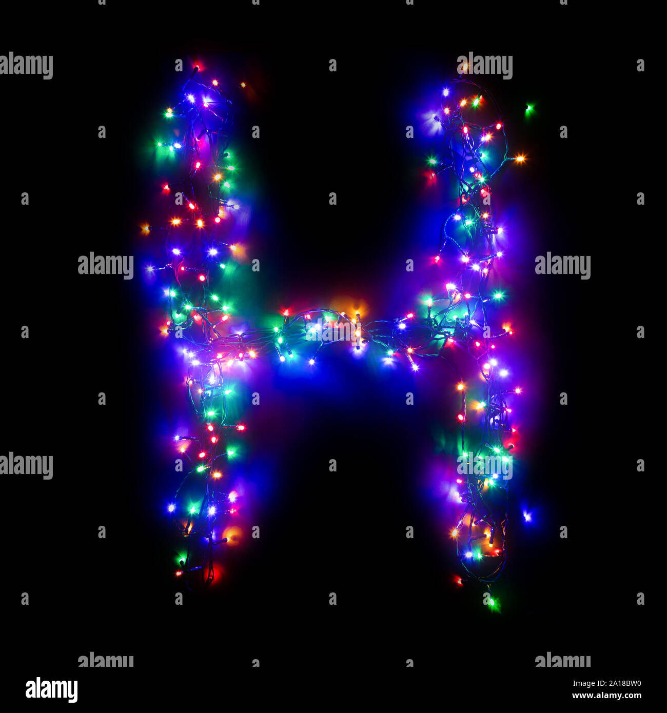The letter "H" of the English alphabet from a multi-colored electric ...