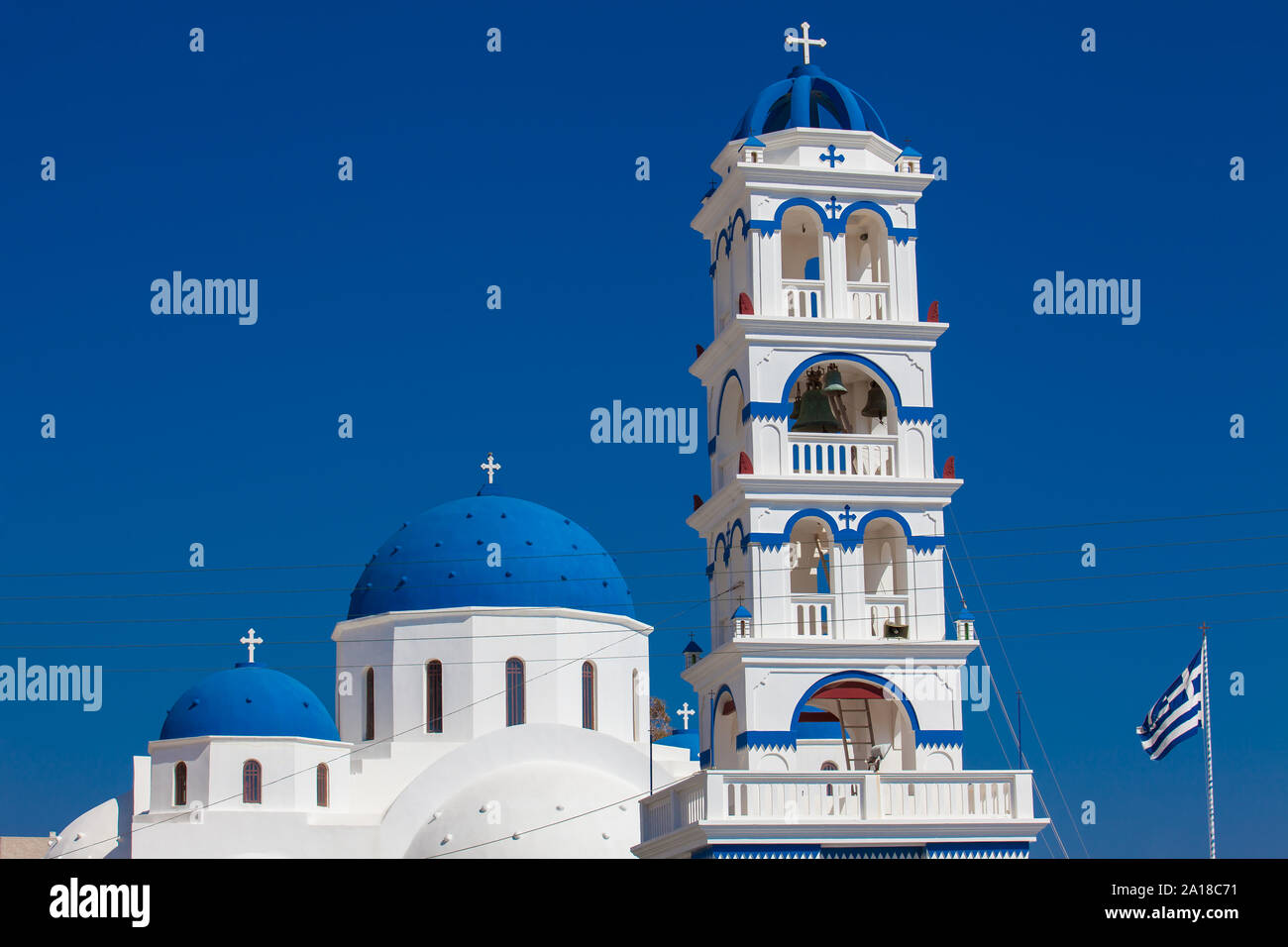 The Church of Holy Cross in the central square of Perissa on Santorini ...
