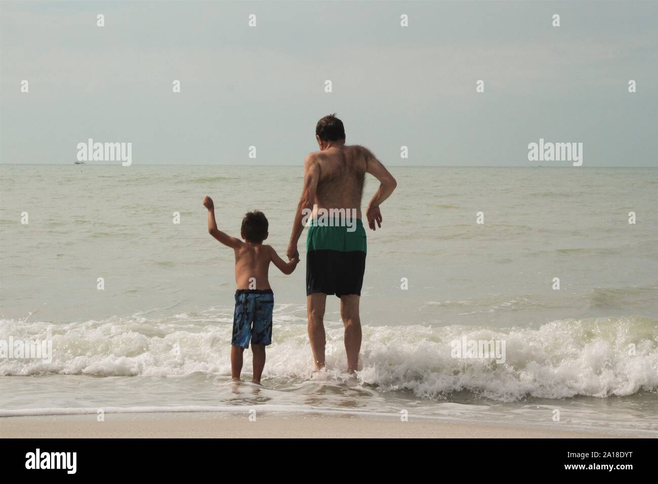 Child jump sand hi-res stock photography and images - Alamy