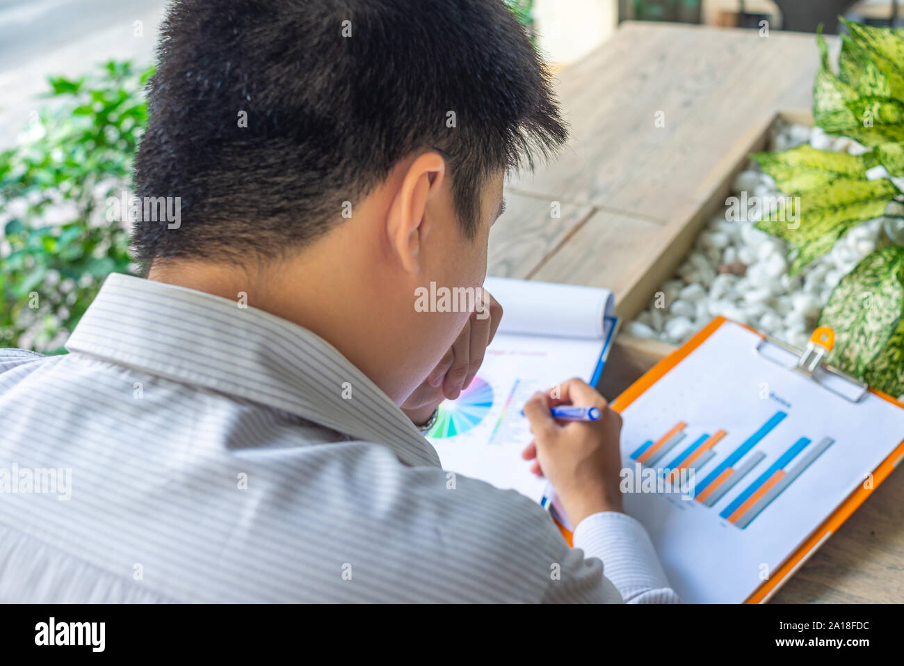 Working on statistics hi-res stock photography and images - Alamy