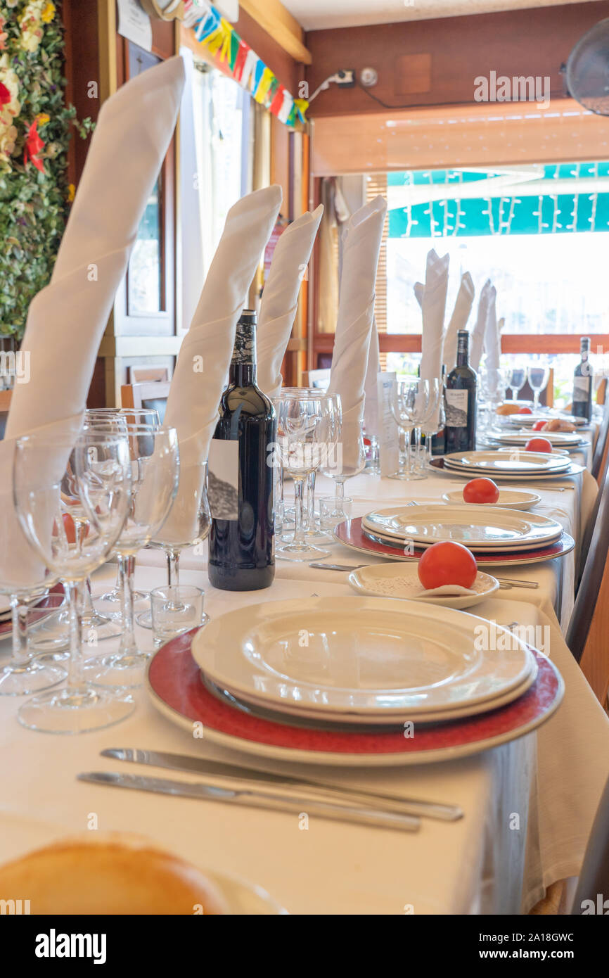 Beautiful banquet table setup with wine glass and tableware Stock Photo ...